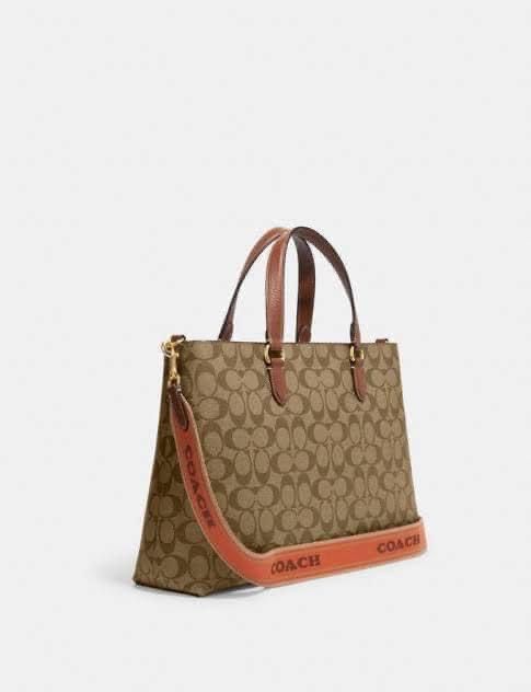 Coach Signature Tyler Cross Body on Carousell