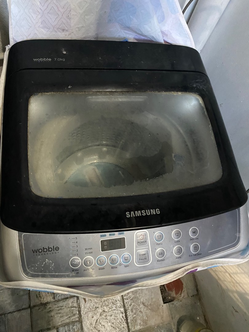 Defective washing machine on Carousell