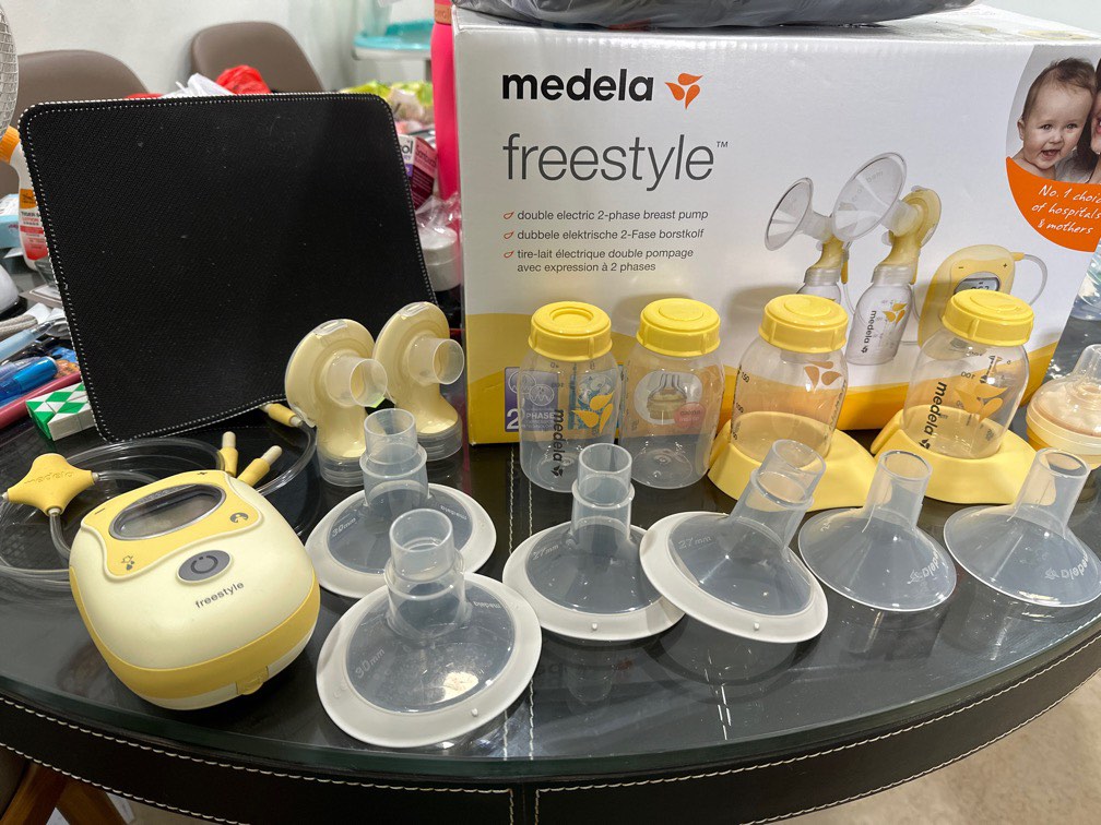 Medela Breast Pump. Still under warranty, Babies & Kids, Nursing ...