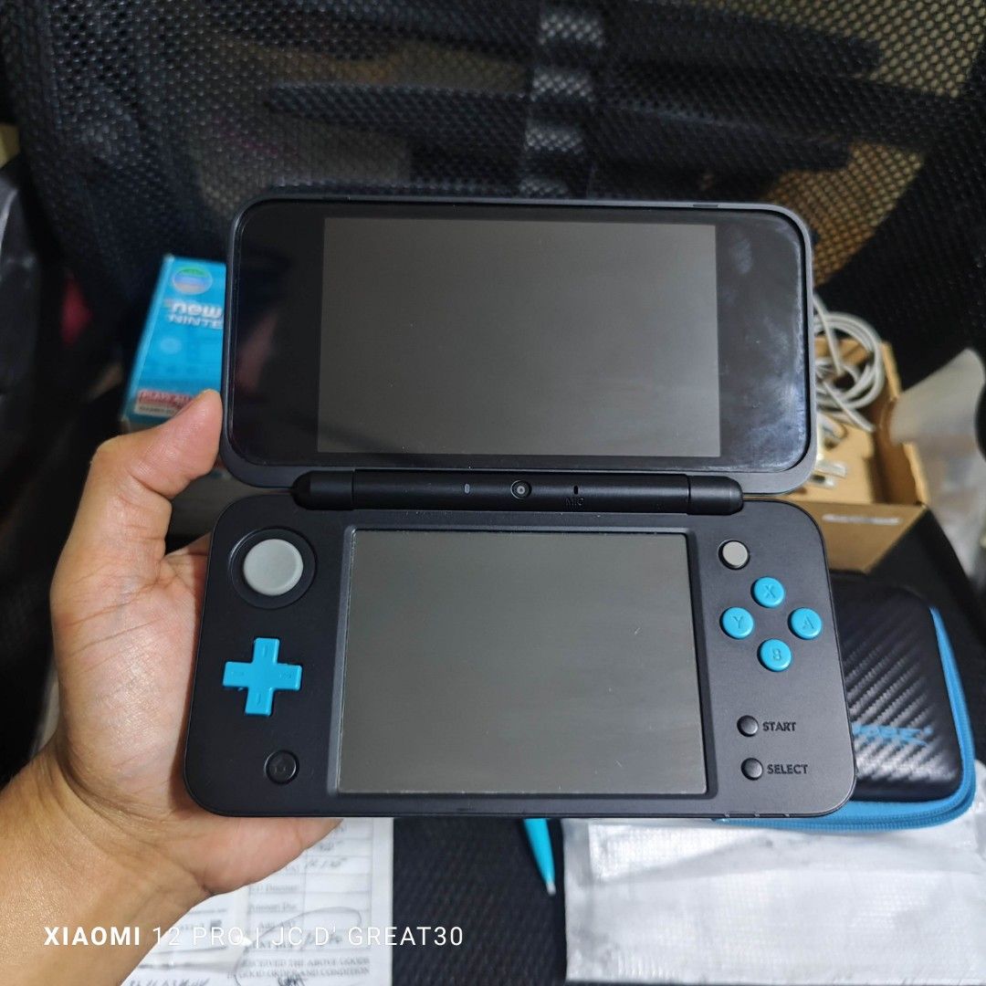 New nintendo 2DS XL black x torquoise Complete (Good as new), Video ...