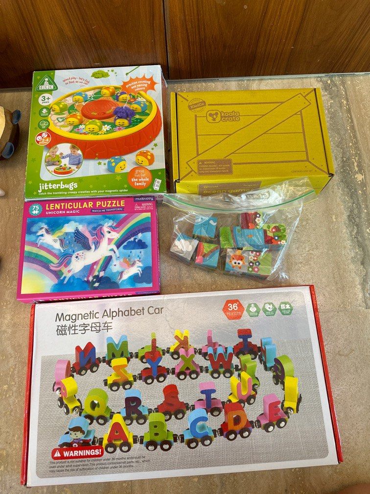 Unicorn Puzzle, Magnetic alphabet car, Jitterbugs game, Ocean game set ...