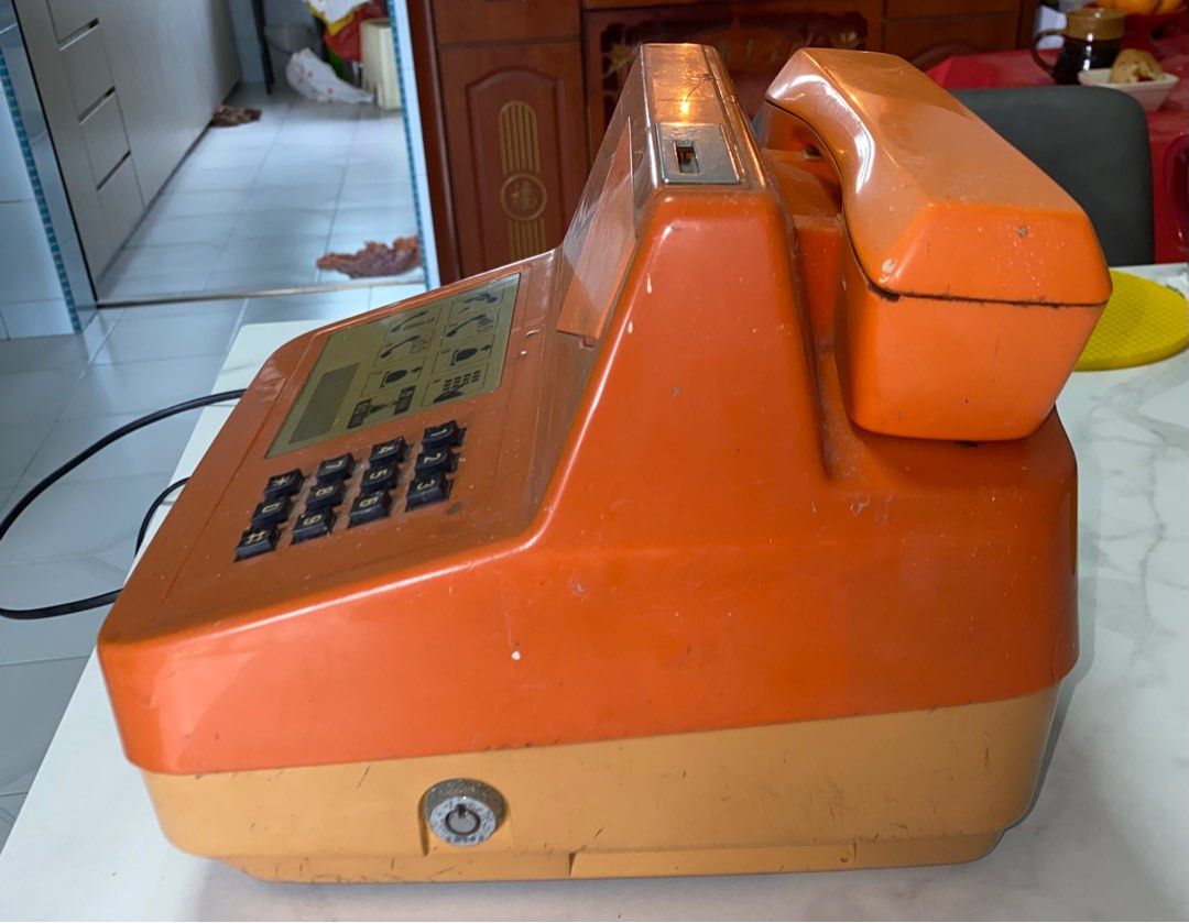 Vintage orange pay phone coin phone . FIXED PRICE , Hobbies & Toys ...