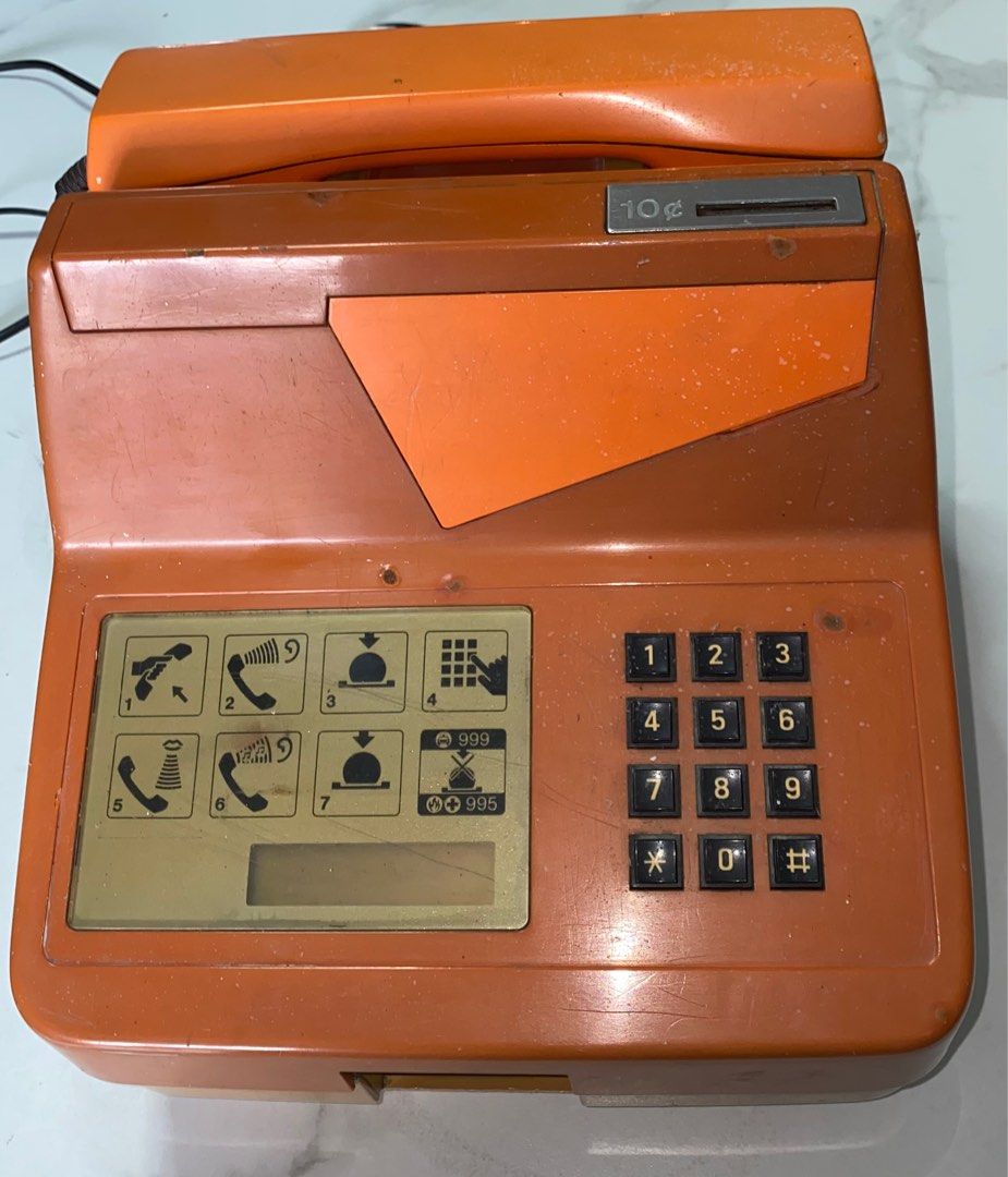 Vintage orange pay phone coin phone . FIXED PRICE , Hobbies & Toys ...