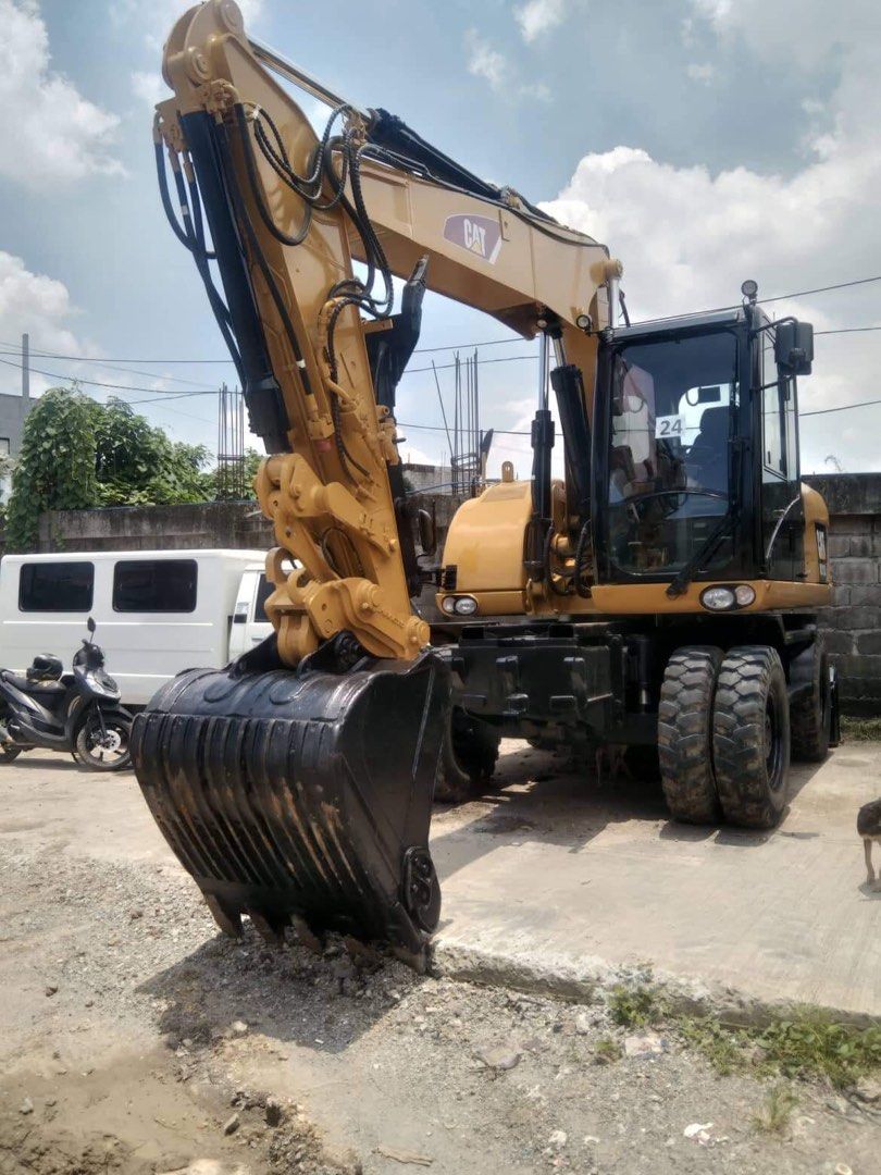 Caterpillar Wheel-type Backhoe on Carousell