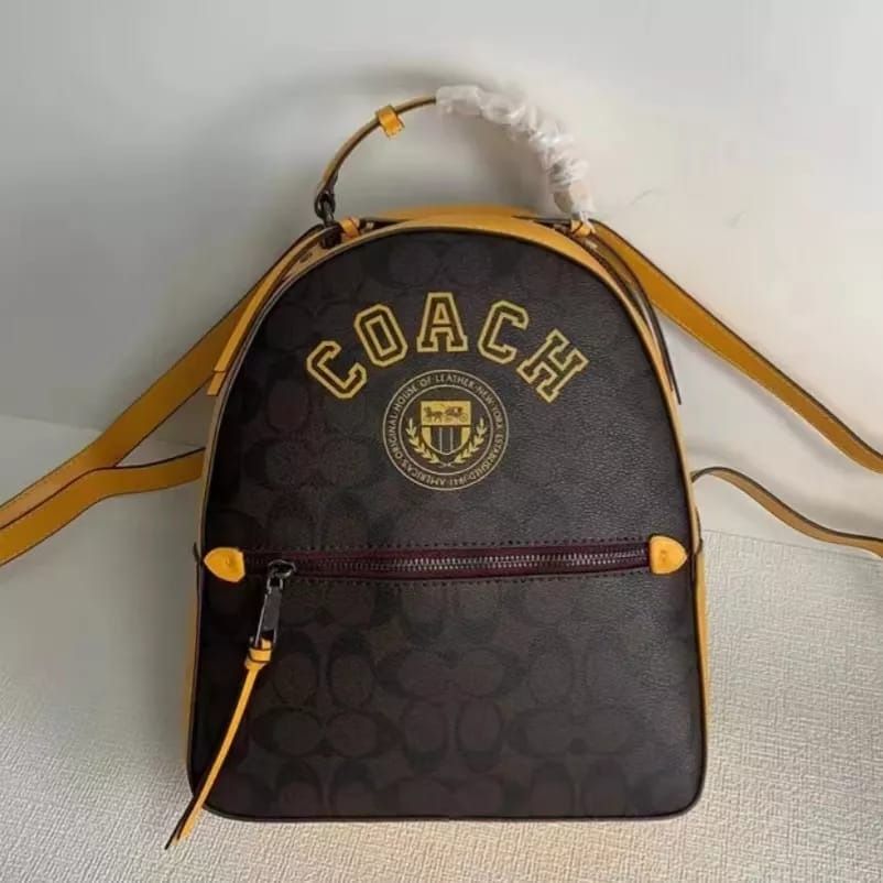 Coach Jordyn Backpack In Signature Canvas With Varsity Motif (Women ...