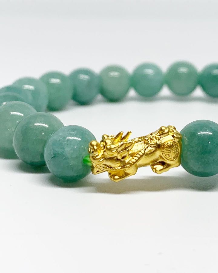 Natural Blue Water Jade with Real 24K Gold Pixiu • on Carousell