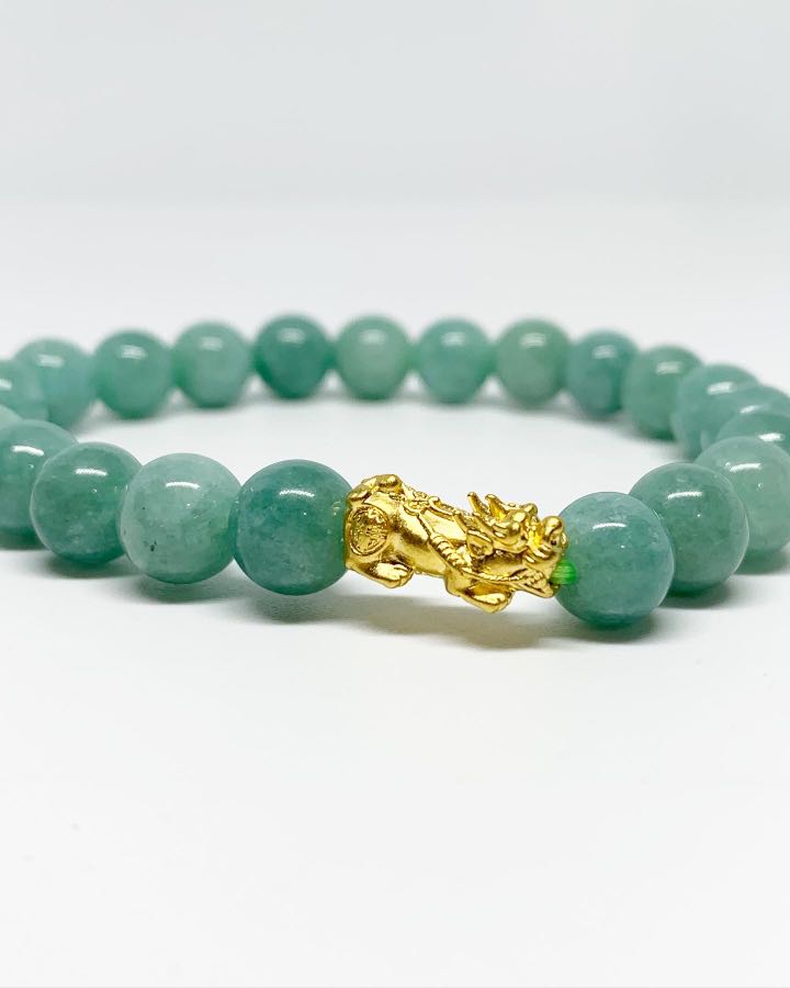 Natural Blue Water Jade with Real 24K Gold Pixiu • on Carousell