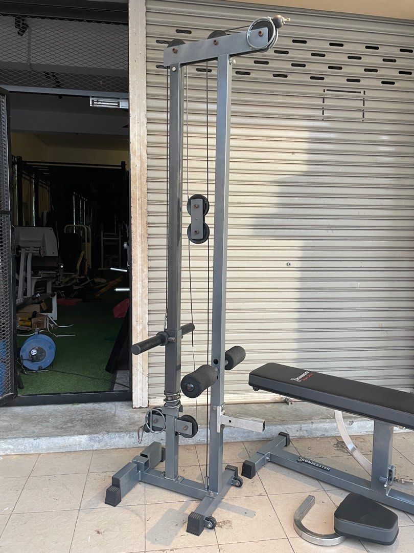 Ironmaster super bench with cable lat row tower attachment gym ...