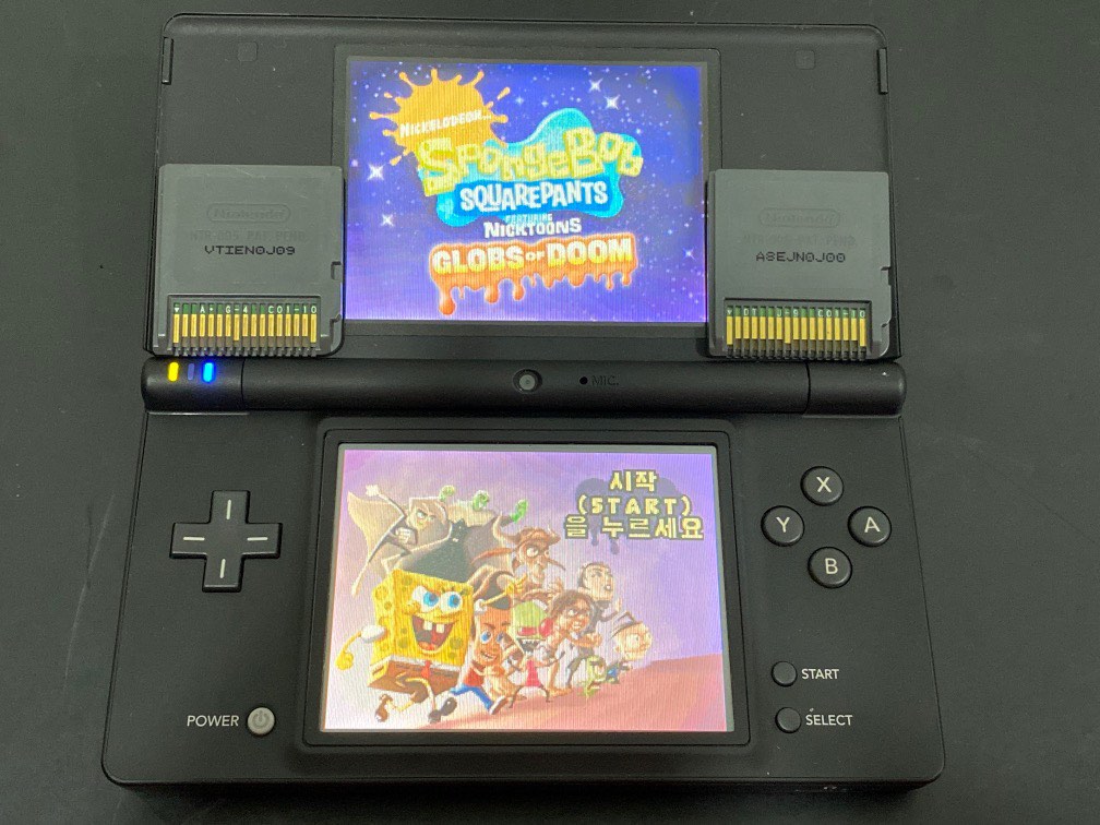 Nintendo DSi & 2 games, Video Gaming, Video Game Consoles, Nintendo on Carousell