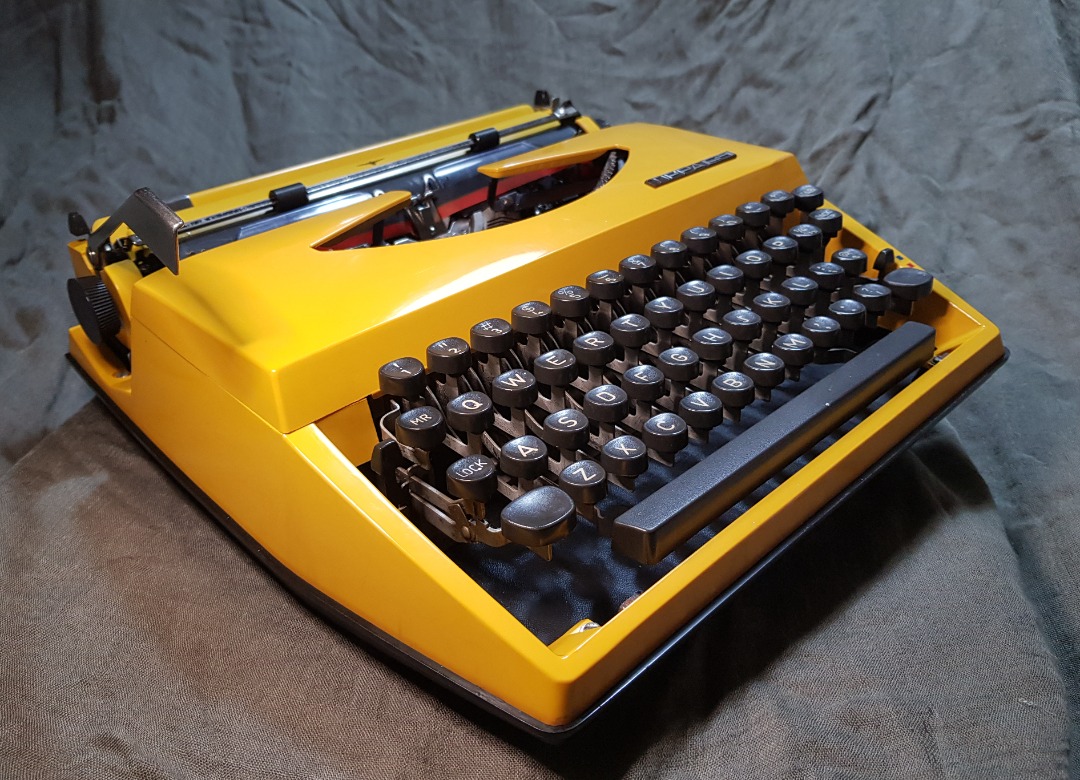 ORIGINAL YELLOW German Adler Tippa S Portable typewriter, Hobbies & Toys, Memorabilia ...