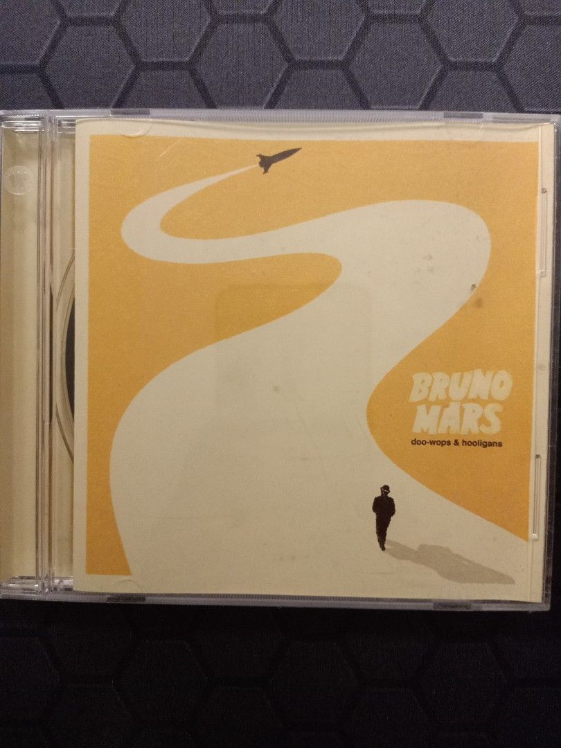 CD BRUNO MARS, Hobbies & Toys, Music & Media, CDs & DVDs on Carousell
