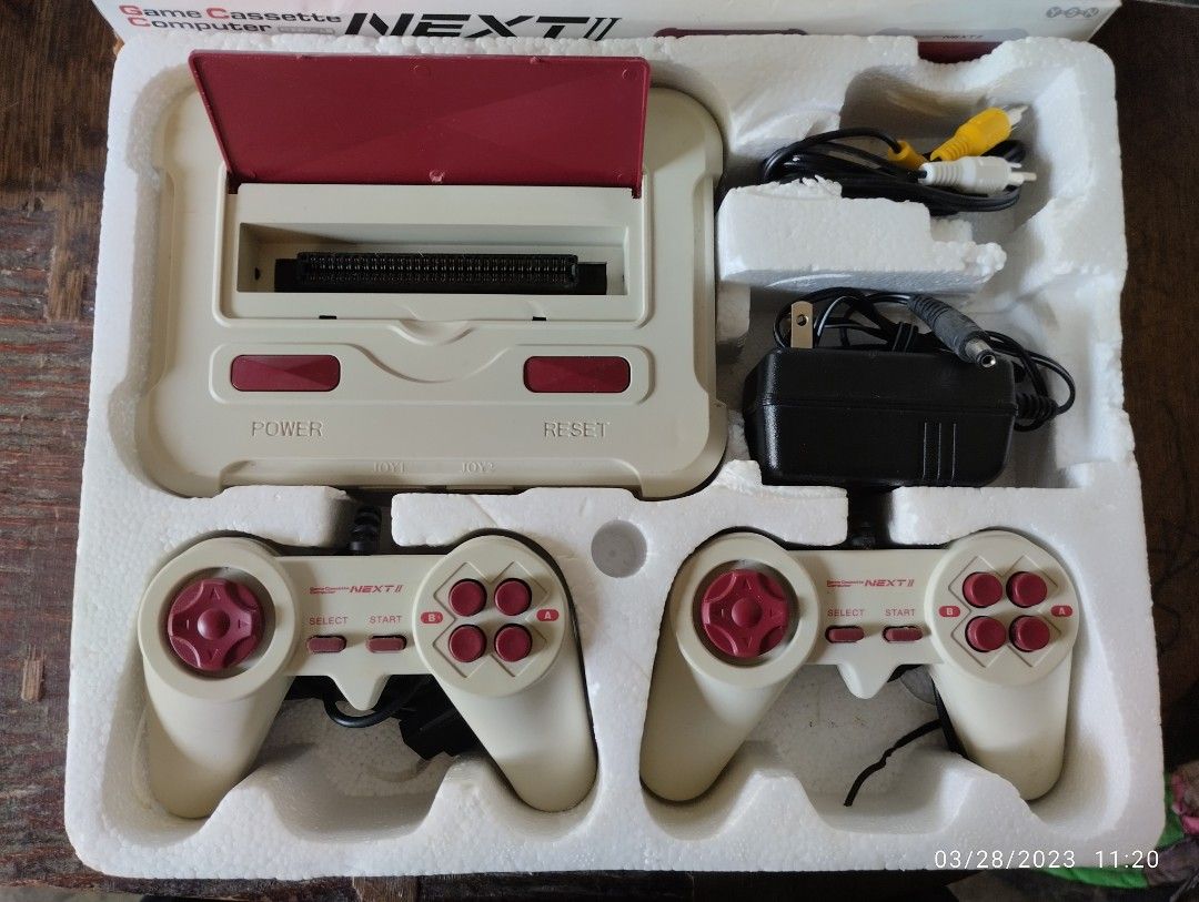 Next II bootleg Famicom console with 8+1 built-in games on Carousell