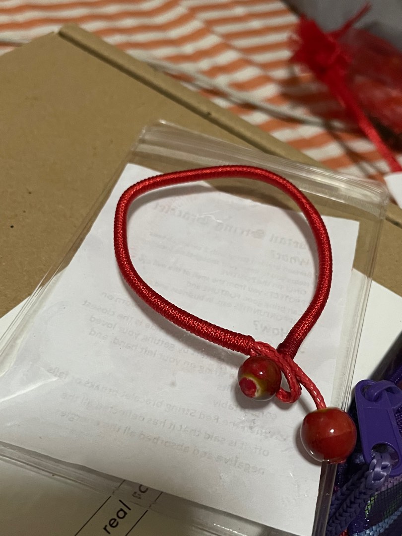 Lucky red string original on Carousell