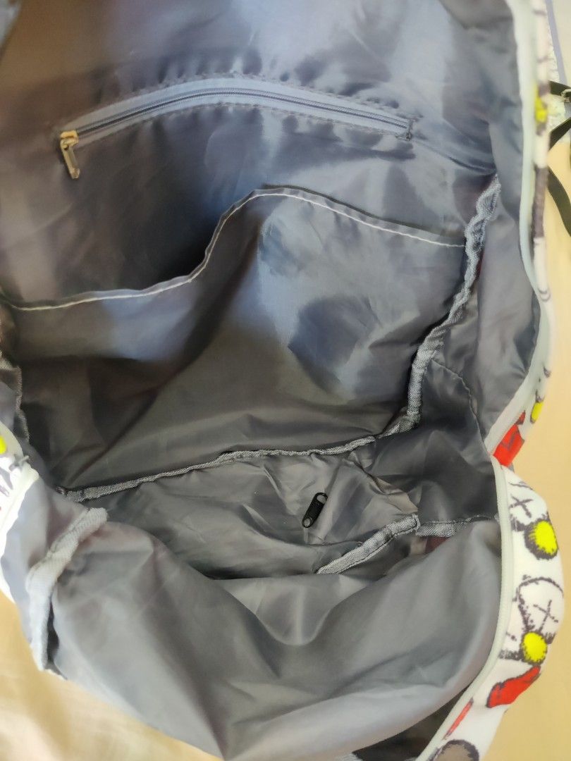 Kaws backpack white with Flaw, Women's Fashion, Bags & Wallets ...