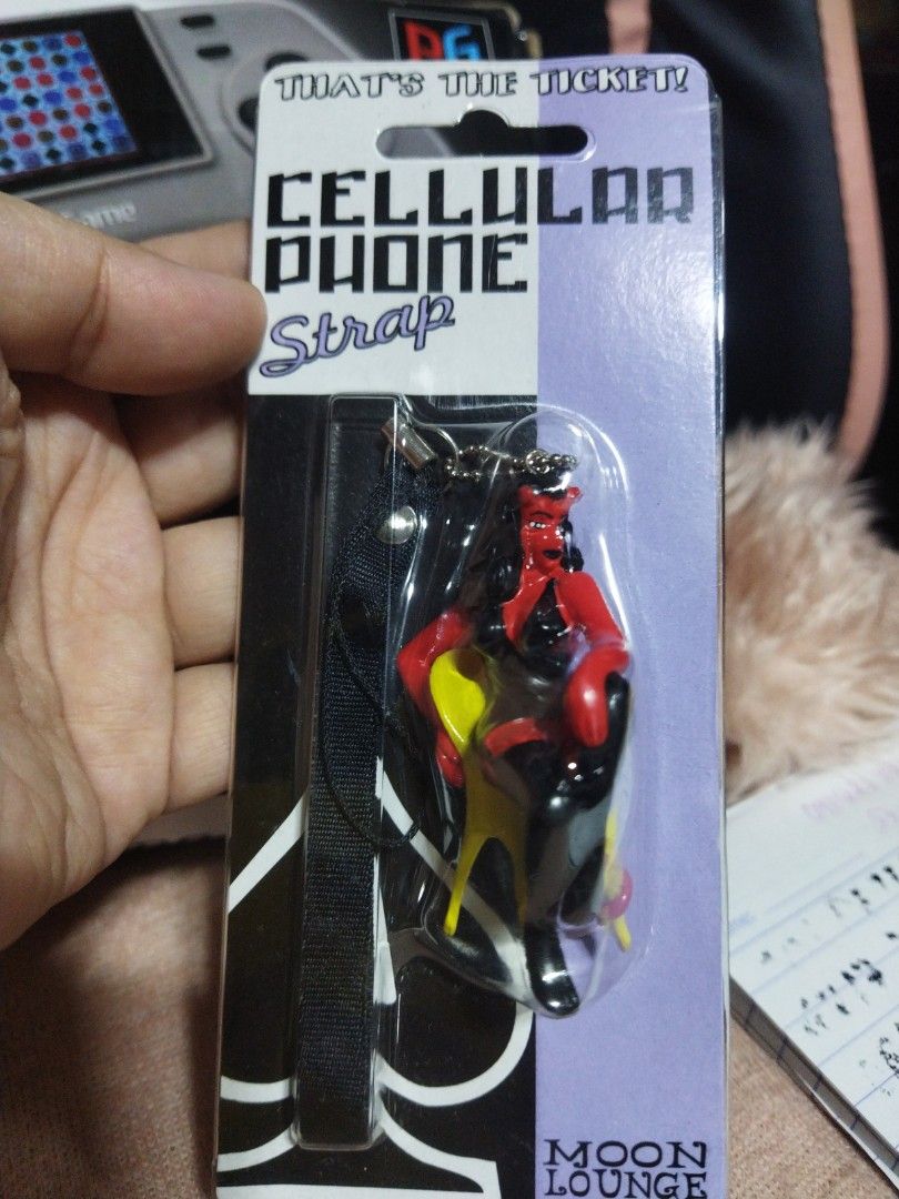 Cell strap devil on Carousell