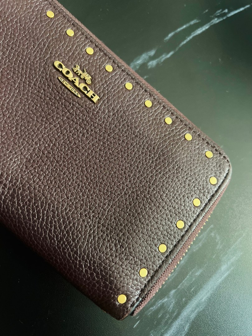 COACH Oxblood Rivet Border Slim Wallet on Carousell