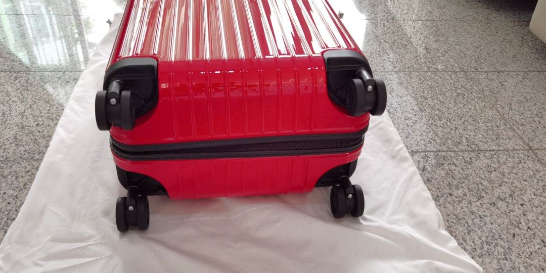 Rimowa Essential Lite Cabin Luggage Red Colour, Hobbies & Toys, Travel ...