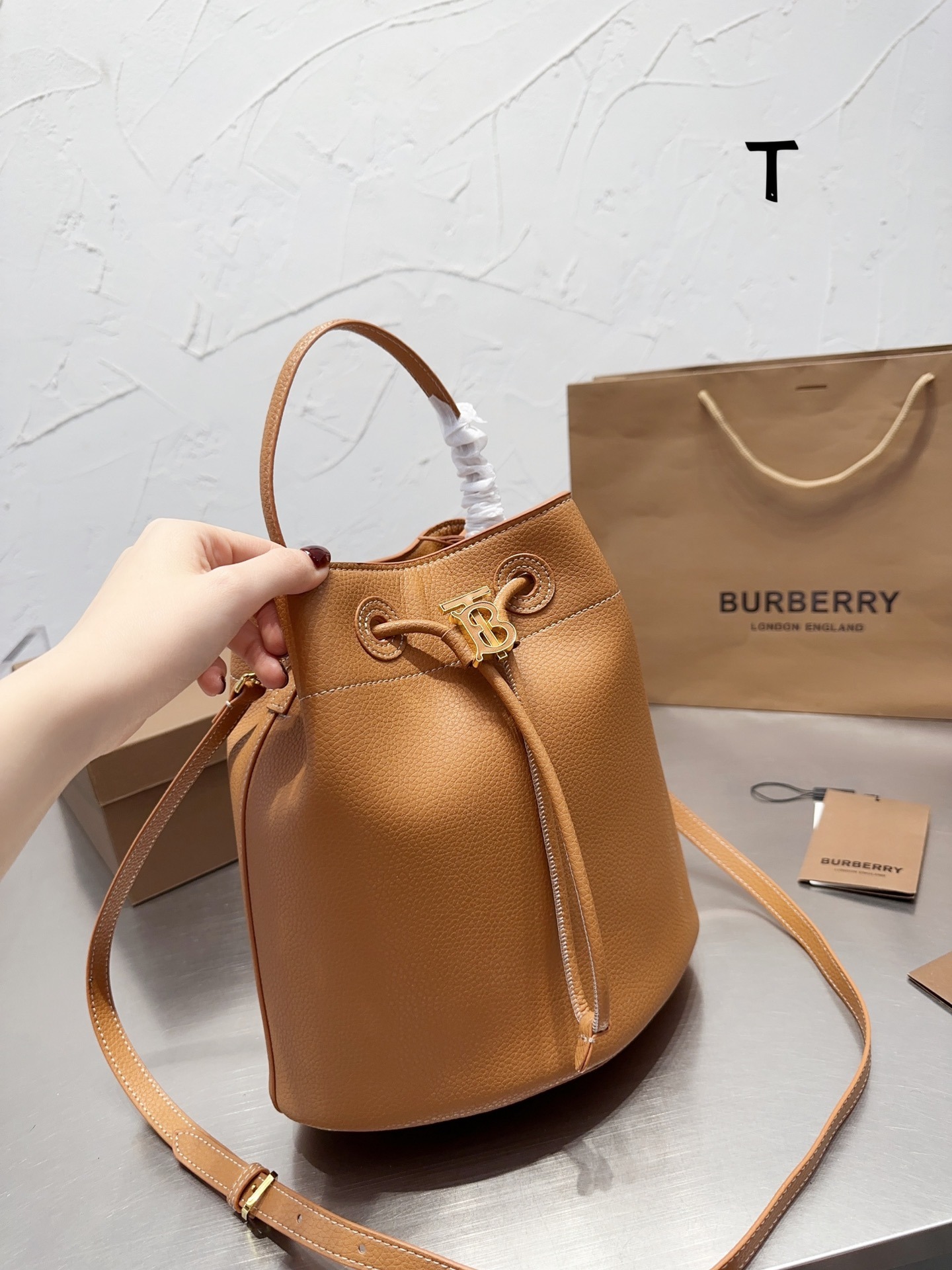 BURBERRY classic bucket bag, Luxury, Bags & Wallets on Carousell