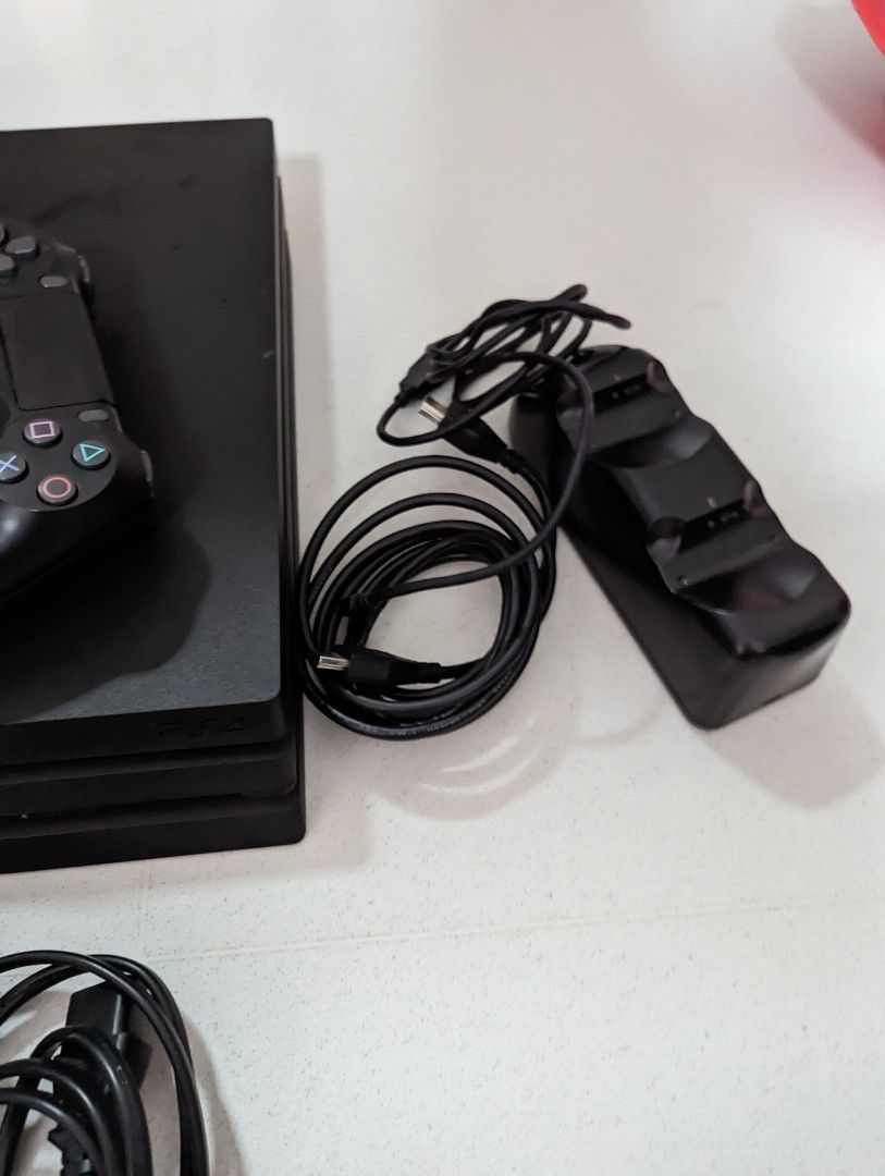 Ps4 pro console good condition with extra charging dock and controller ...