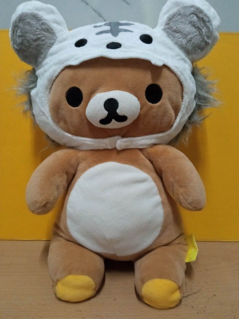 Rilakkuma with removable tiger head dresses amd with zipper compartment ...