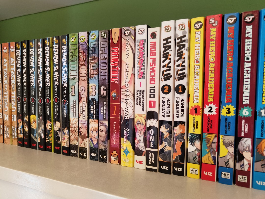 Various manga books: Demon Slayer, My Hero Academia, One Piece, Naruto ...