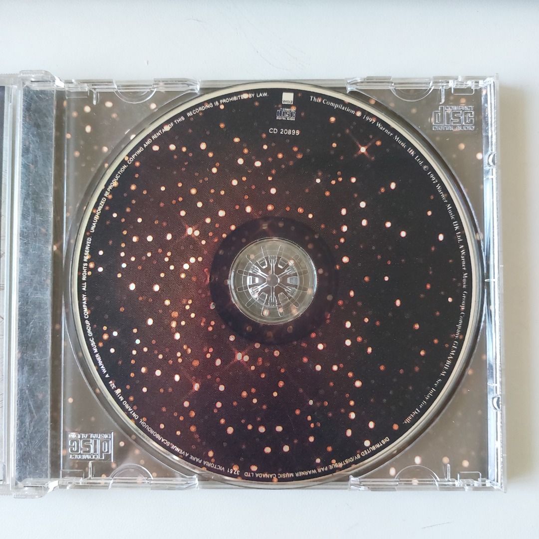 Enya's Paint the Sky with Stars: The Best of Enya Album on Carousell