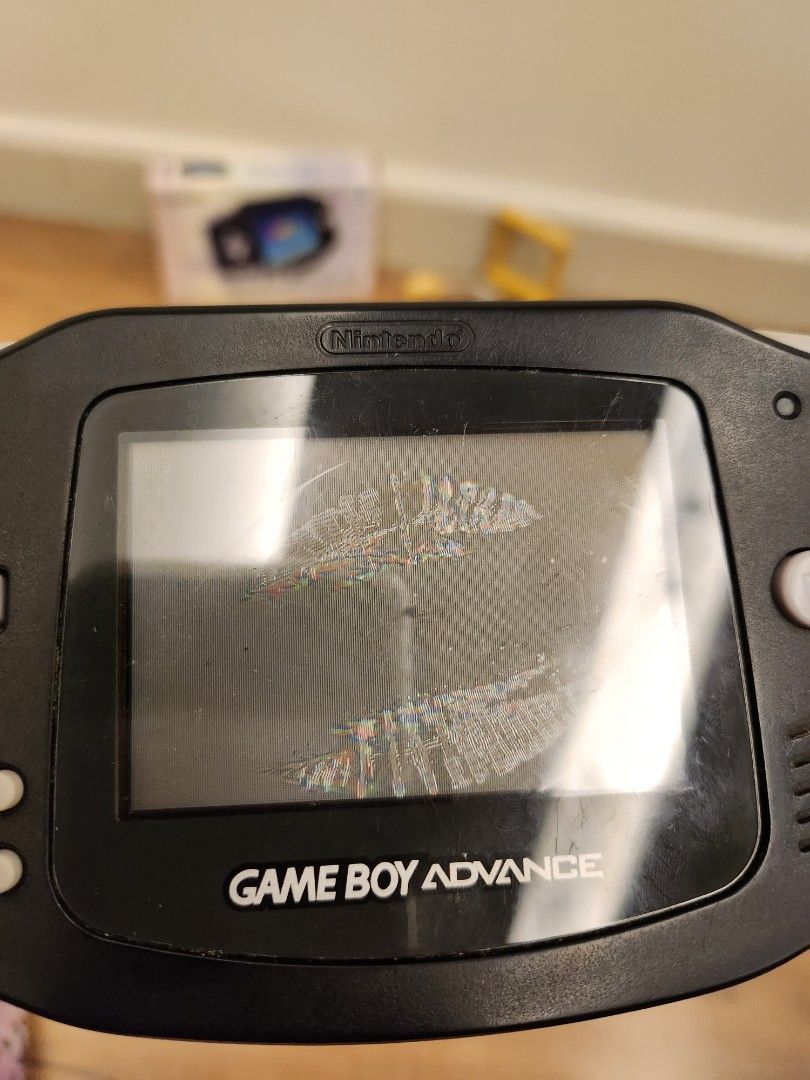 Gameboy Advance (Black) with 28 authentic games (harry potter, mario ...