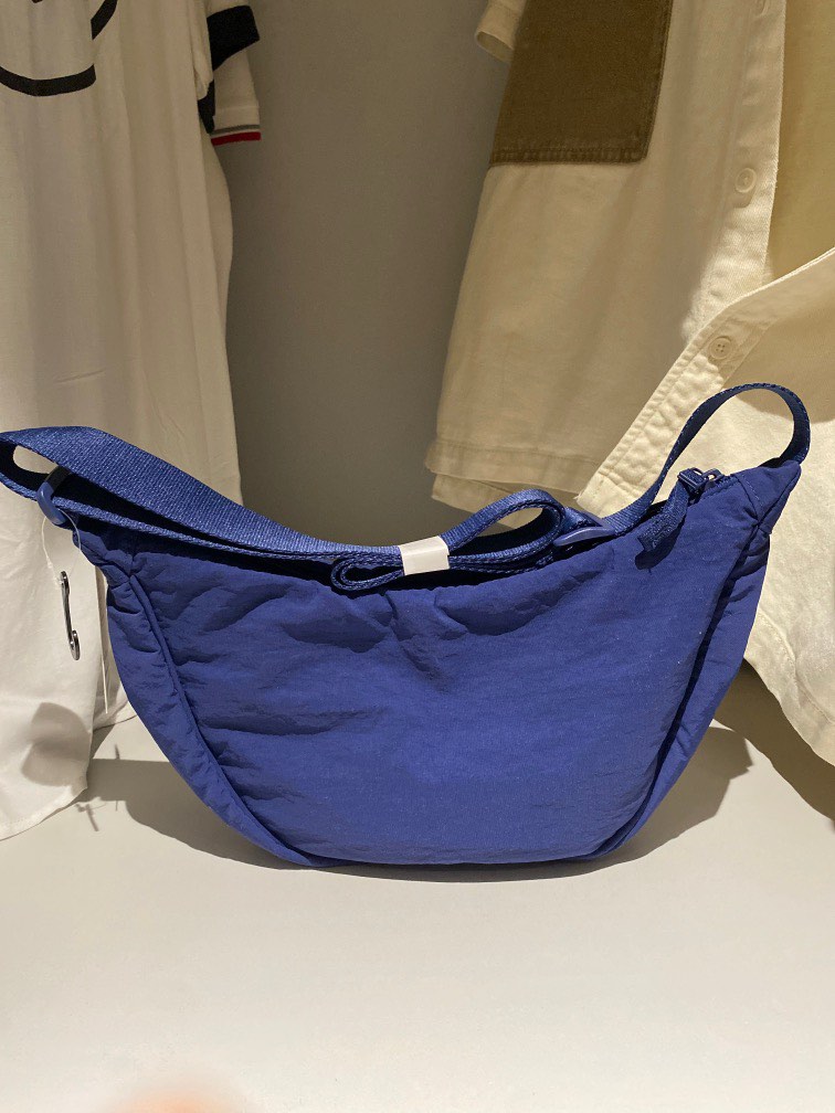Uniqlo dumpling bag on Carousell