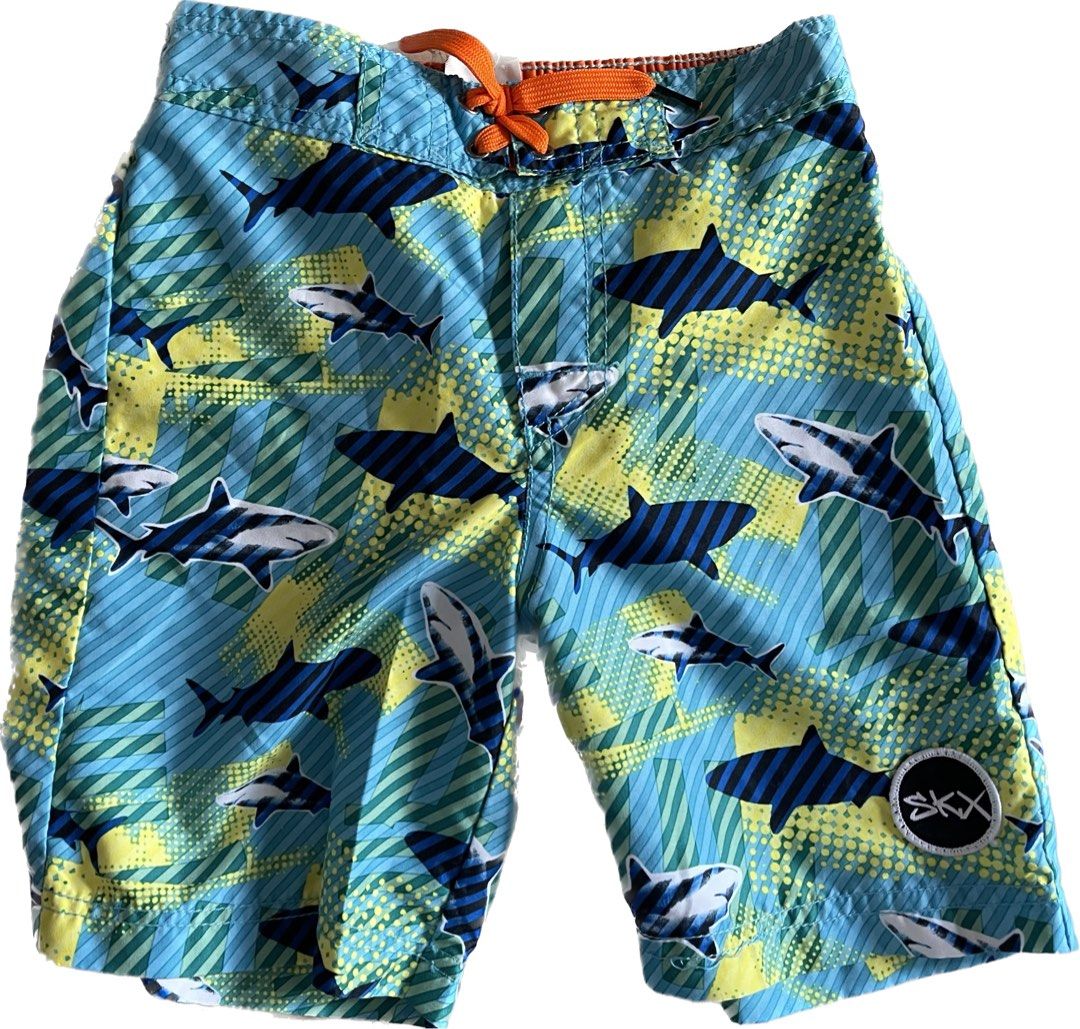 Rash guard and board shorts bundle on Carousell