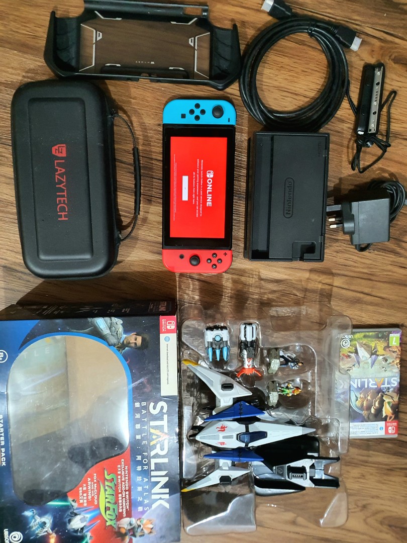Nintendo switch V2 complete with starlink game set and lots of games ...