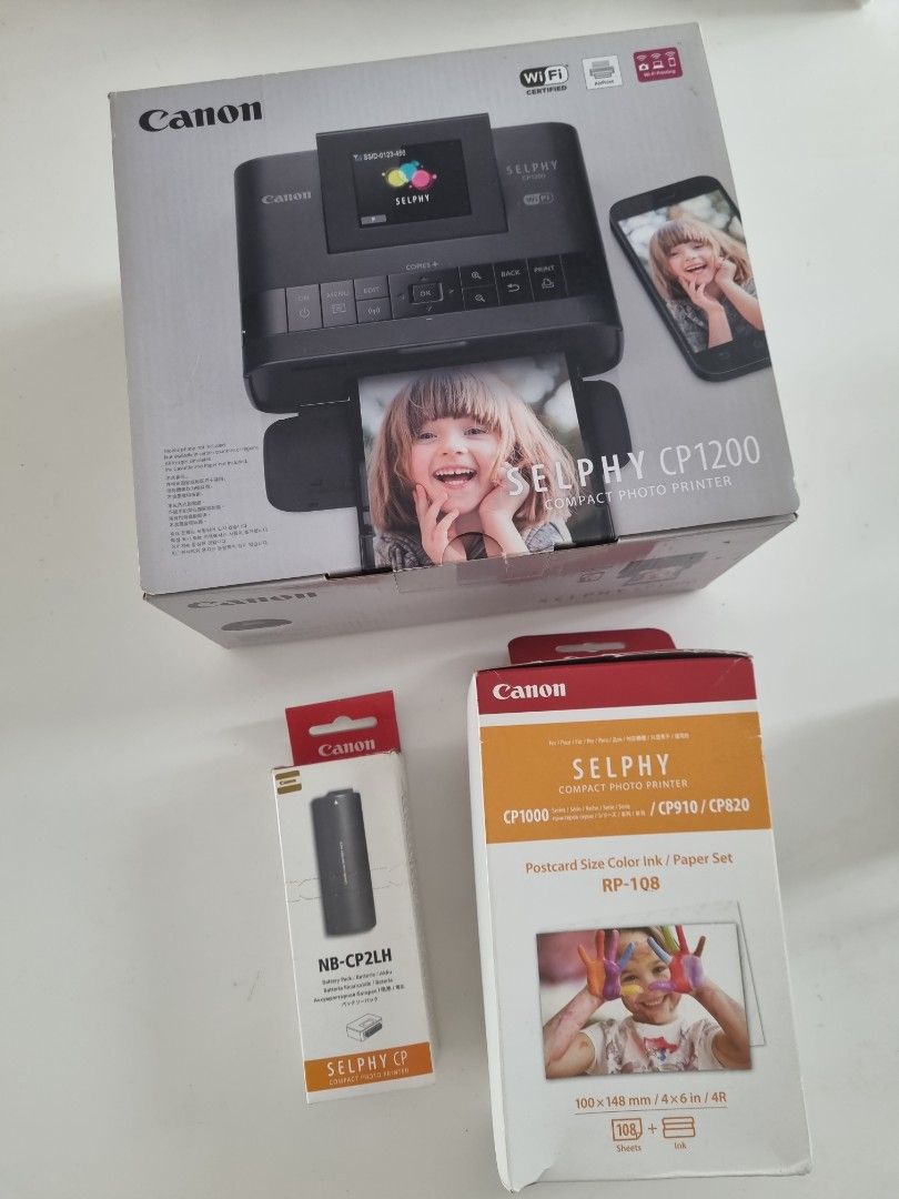 Canon selphy printer with paper set, ink &battery . Unwrapped ...