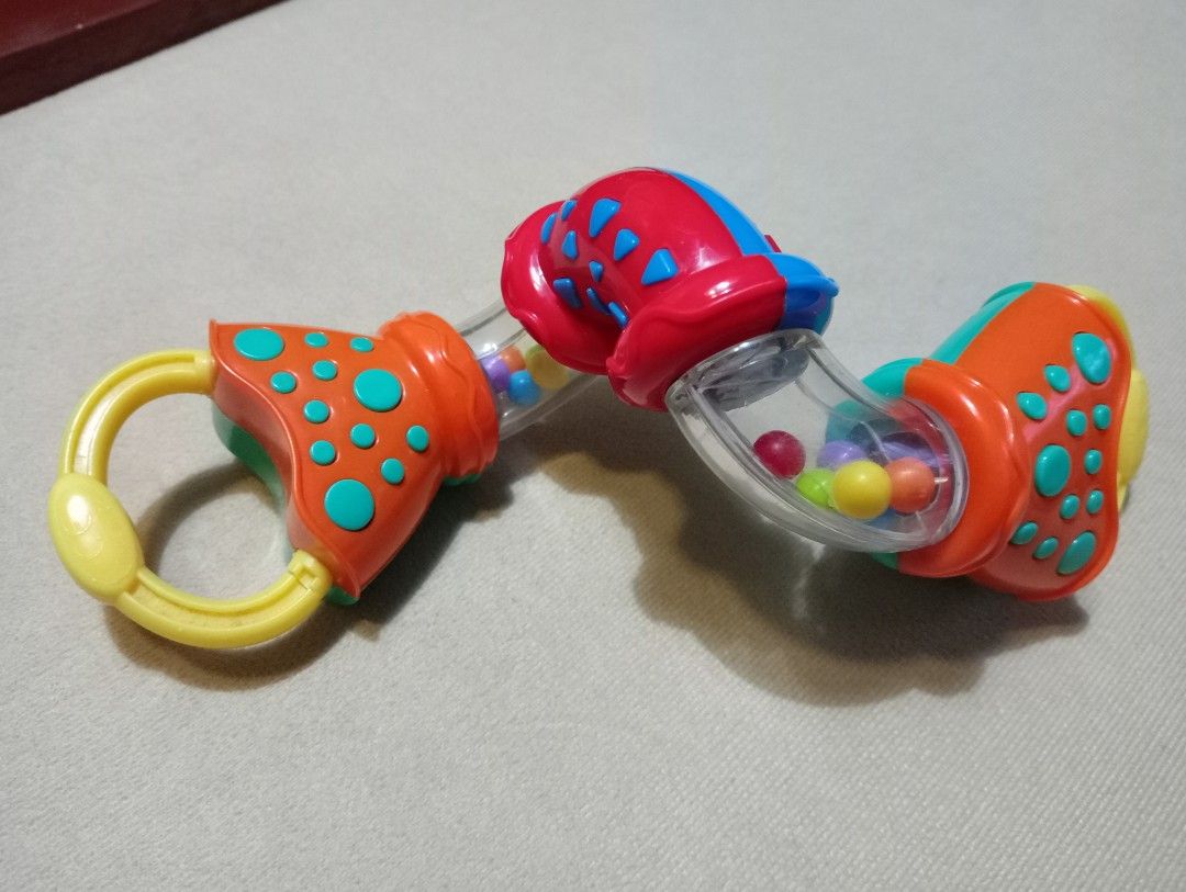 Twisty clicks multi-sensory rattle, Babies & Kids, Infant Playtime on ...