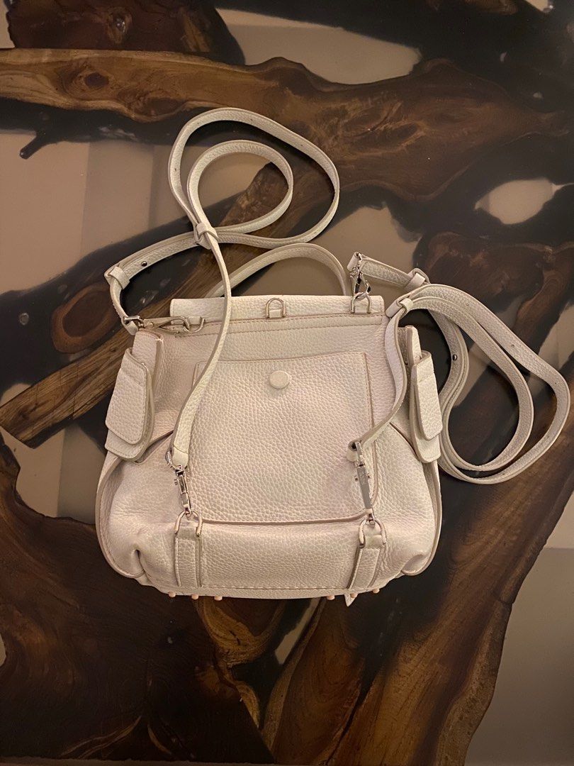 Wave Bag grain leather backpack white, Luxury, Bags & Wallets on Carousell