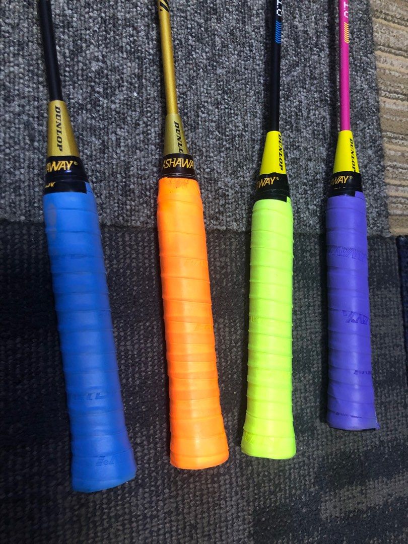 DUNLOP neon with grip tape slightly use ,makinis pa sold per pair ...