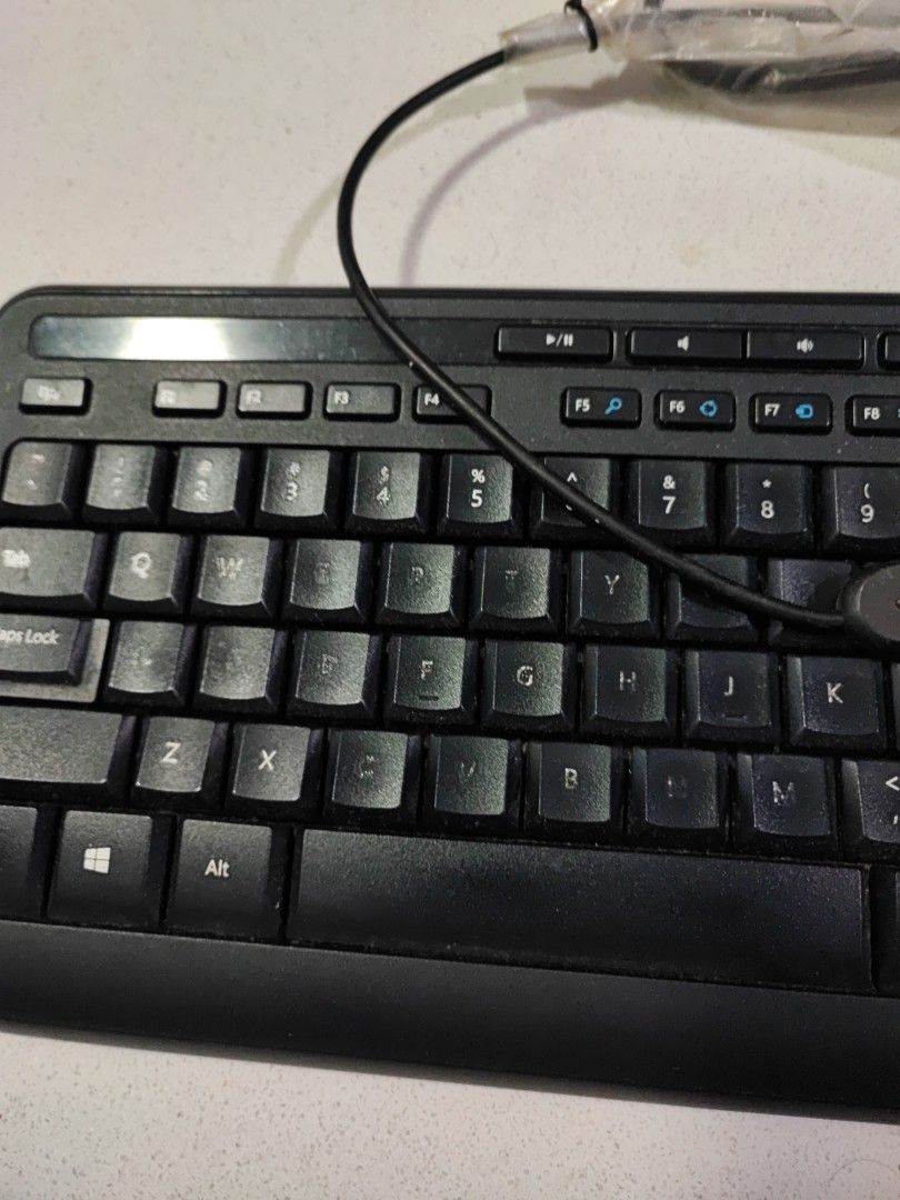 Microsoft wired keyboard working perfectly but faded markings ...