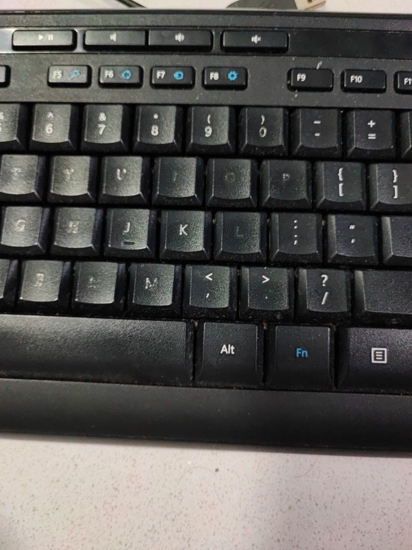 Microsoft wired keyboard working perfectly but faded markings ...