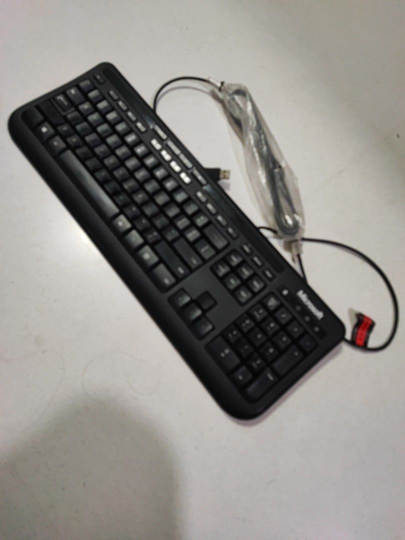 Microsoft wired keyboard working perfectly but faded markings ...