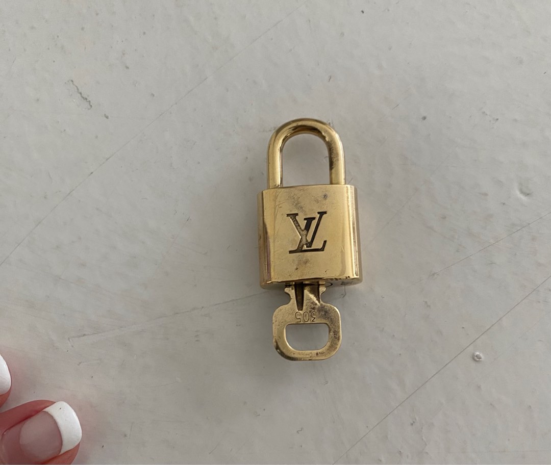 Louis Vuitton lock and key LV, Luxury, Accessories on Carousell
