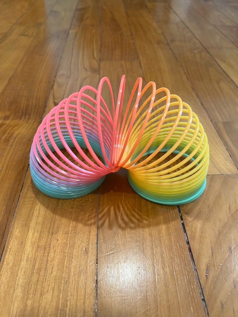 Rainbow Slinky, Hobbies & Toys, Toys & Games on Carousell