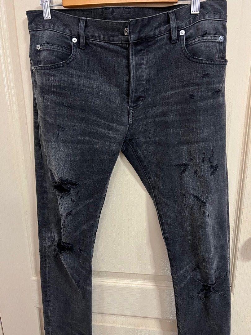 Balmain black distressed denim jeans, Luxury, Apparel on Carousell