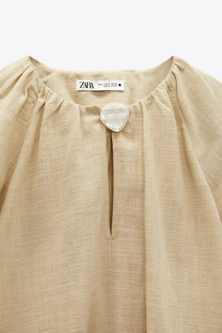 Zara shell button balloon top on Carousell