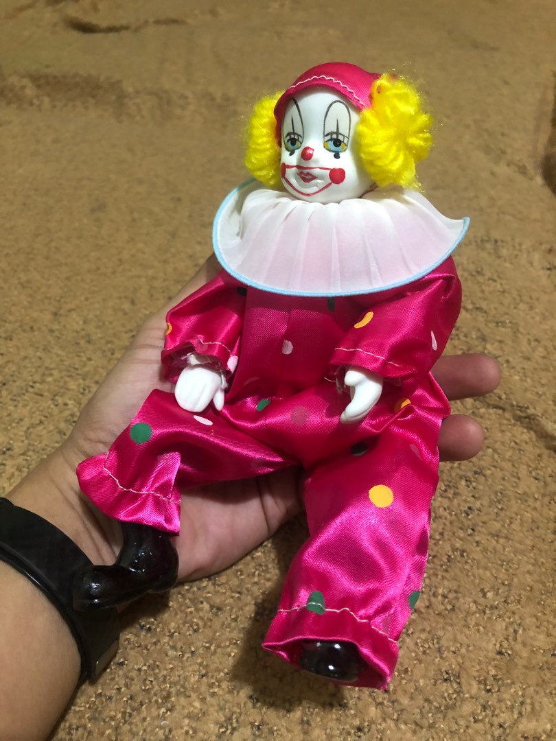 Sitting clown bendable joint wooden figure on Carousell