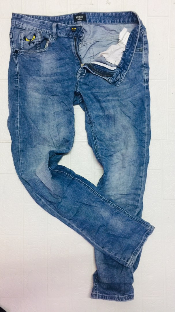 Fendi denim monster pants, Luxury, Apparel on Carousell