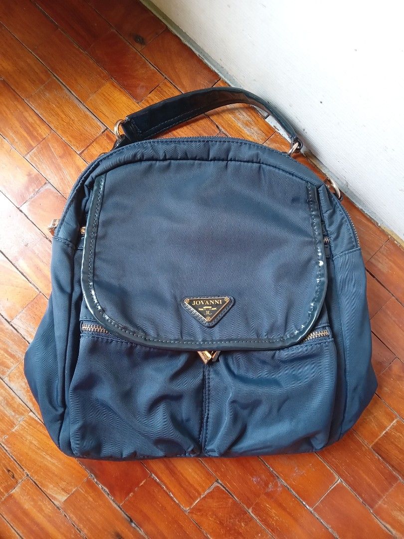Jovanni denim blue backpack / cross-body bag on Carousell