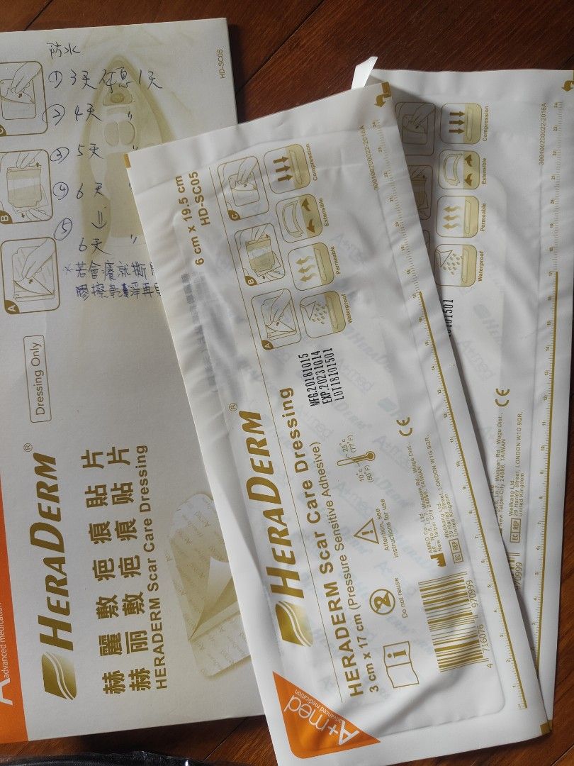 Heraderm scar carr dressing/ stroller rag shade/diaper changing pad ...