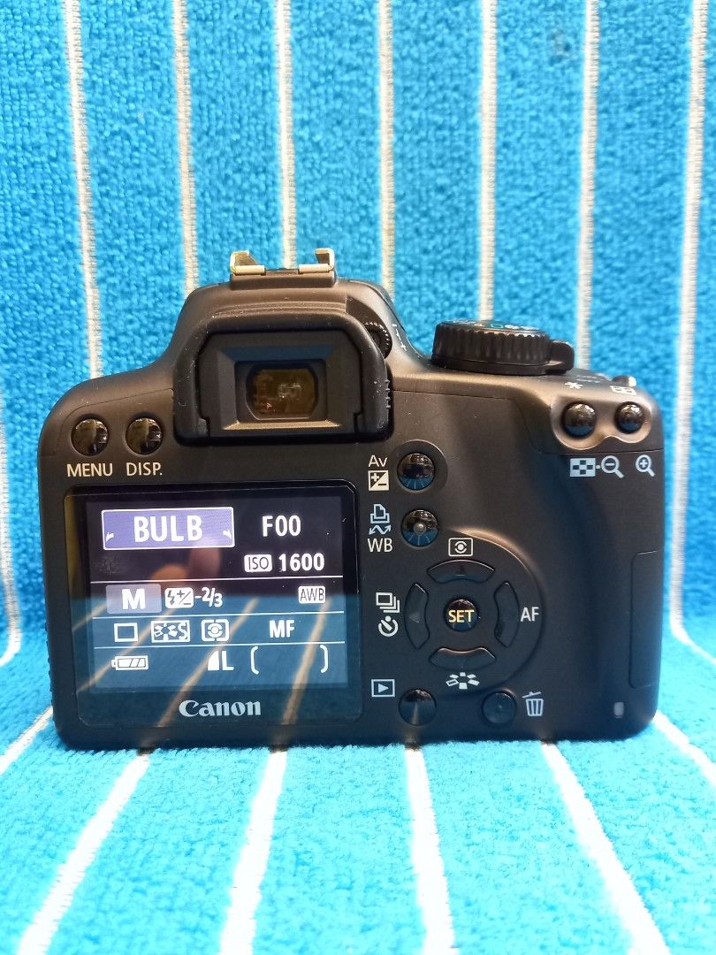 Eos 1000D body Canon, Photography, Cameras on Carousell