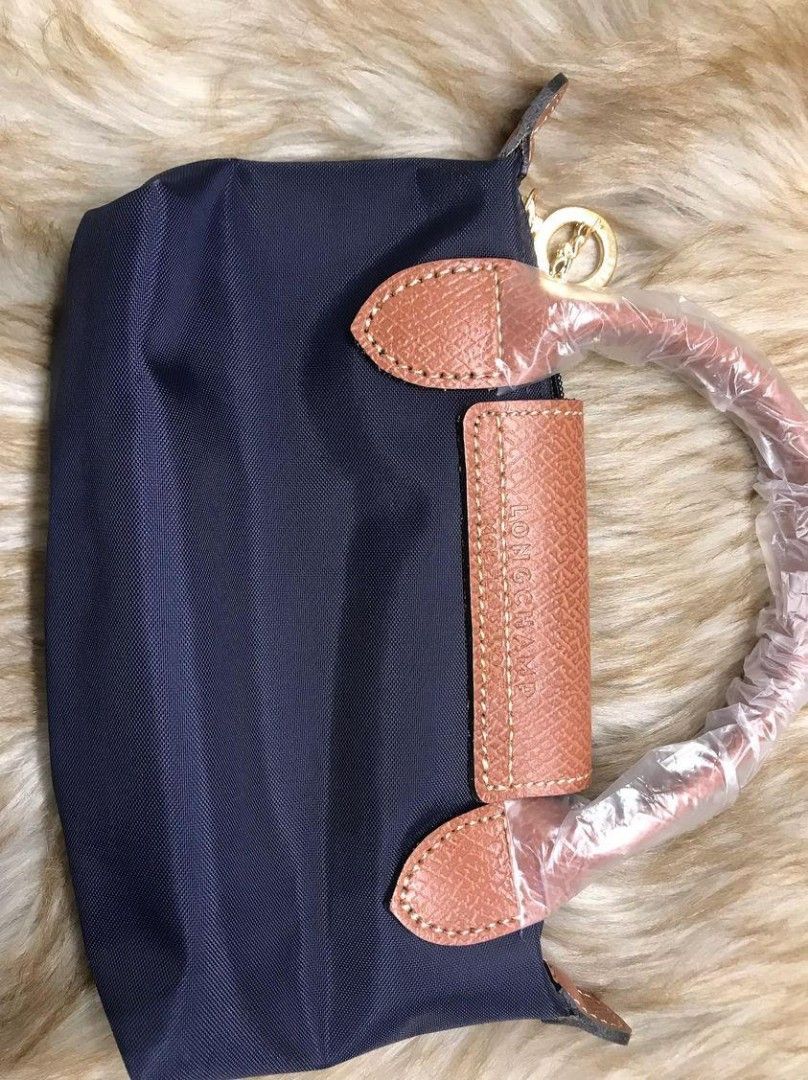 LC pouch with handle, Women's Fashion, Bags & Wallets, Purses & Pouches ...