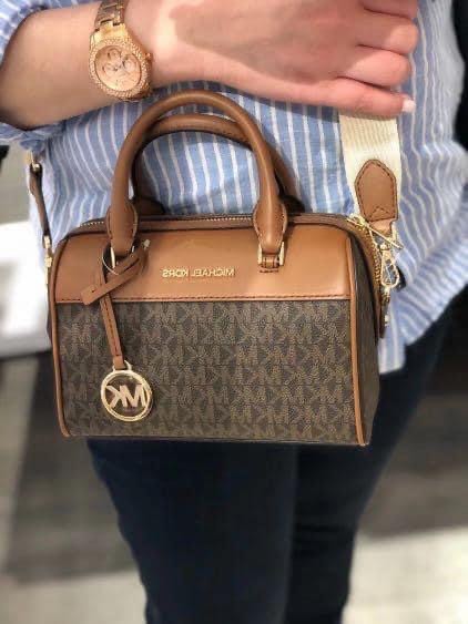 MK XS DUFFLE, Women's Fashion, Bags & Wallets, Cross-body Bags on Carousell