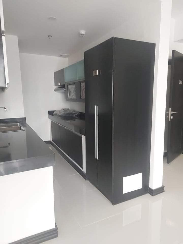 SPACIOUS AND FULLY FINISHED 2-BEDROOM CONDOMINIUM UNIT IN F1 HOTEL FOR ...