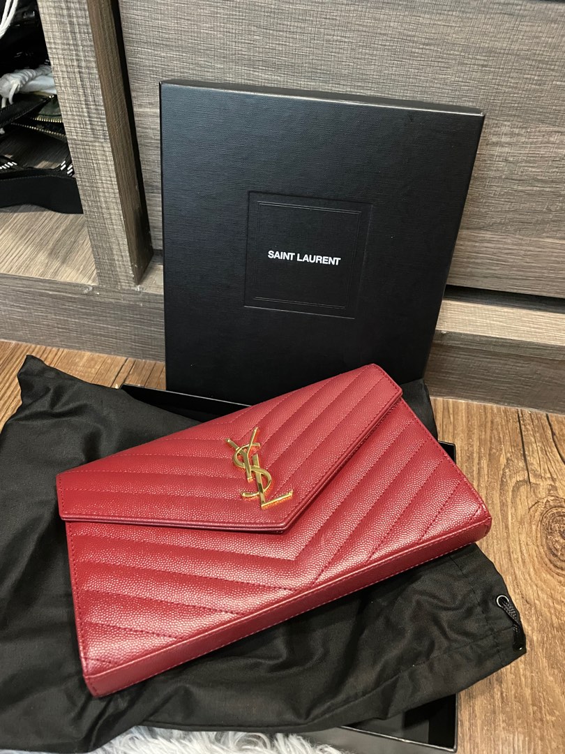 YSL clutch, Luxury, Bags & Wallets on Carousell